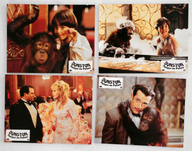 8 movie stills from DUNSTON CHECKS IN (1996)