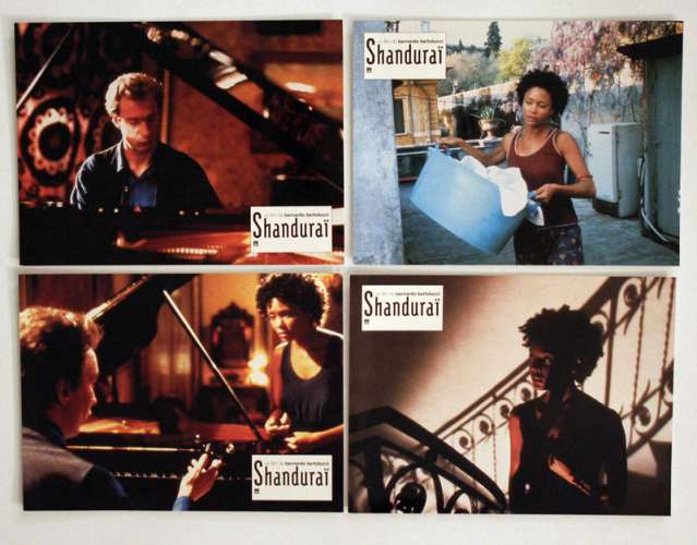 8 movie stills from BESIEGED (1998)