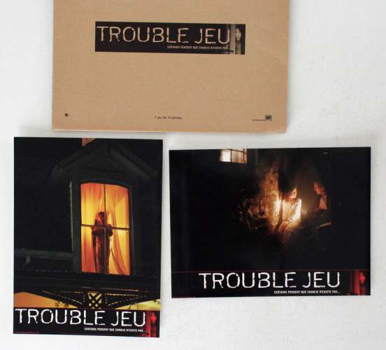 10 photos d'exploitation du film TROUBLE JEU (2005)